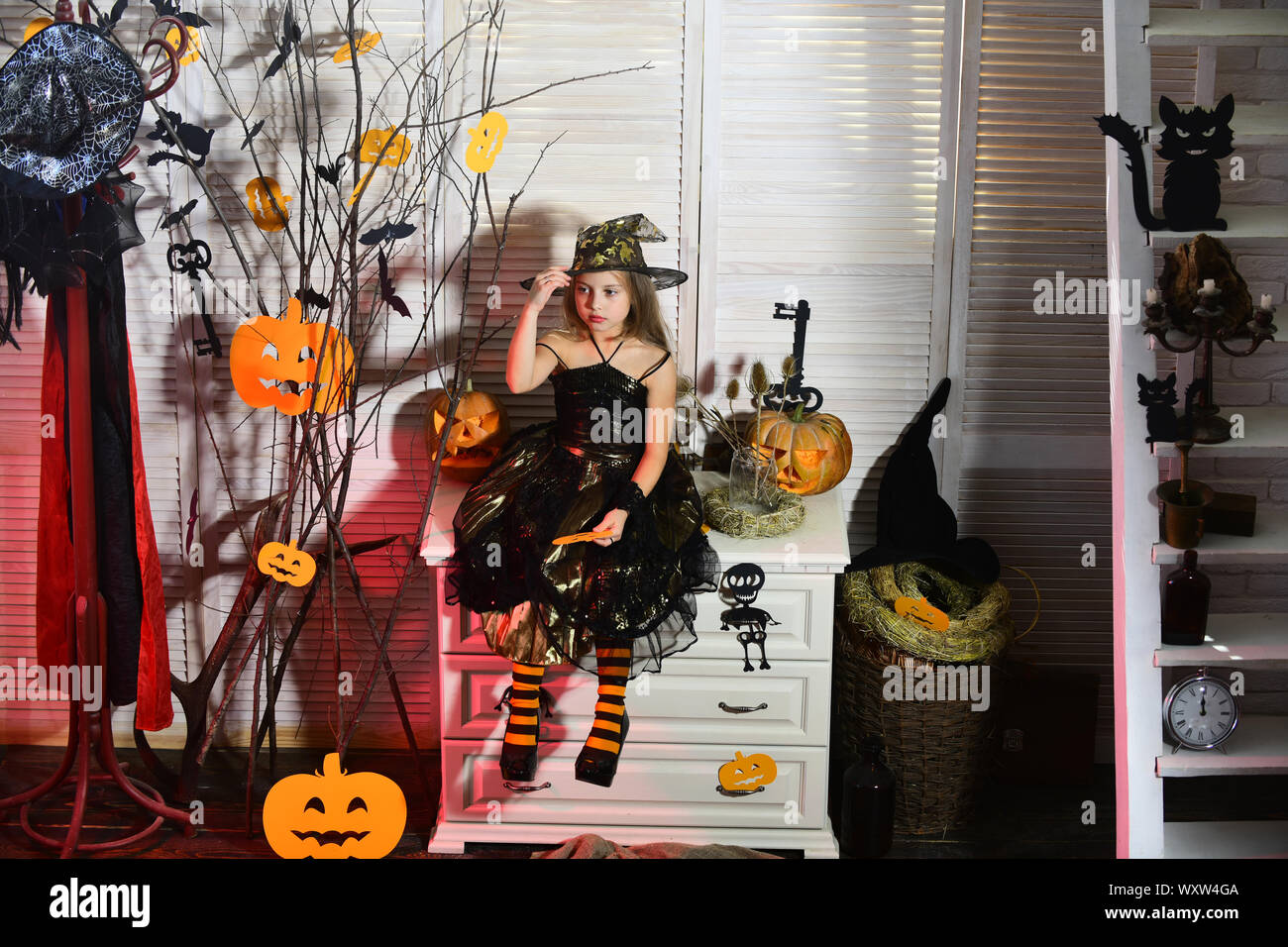 Halloween party and celebration concept. Girl with confused face on ...