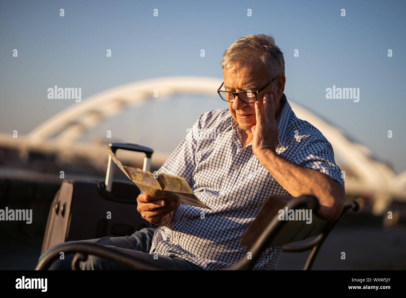 Outdoor portrait of senior man who is on vacation Stock Photo - Alamy
