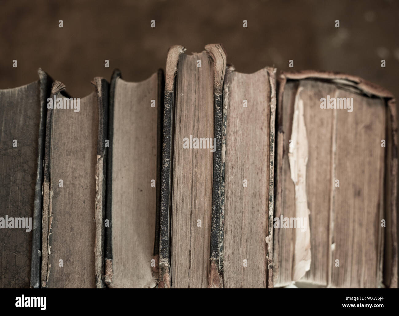 A stack of old tattered books Stock Photo - Alamy