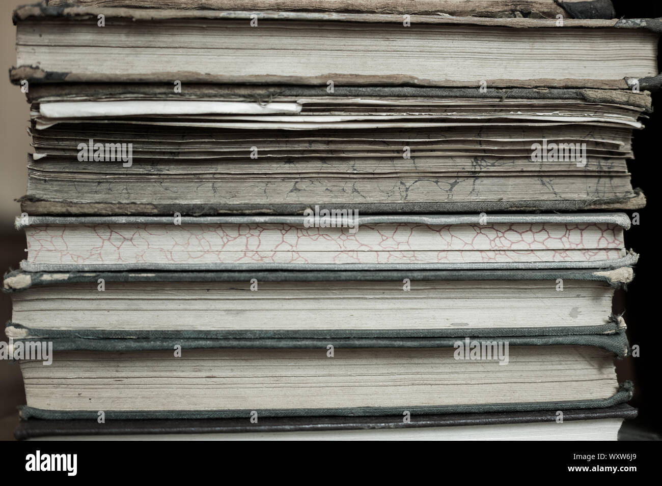 A stack of old tattered books Stock Photo - Alamy