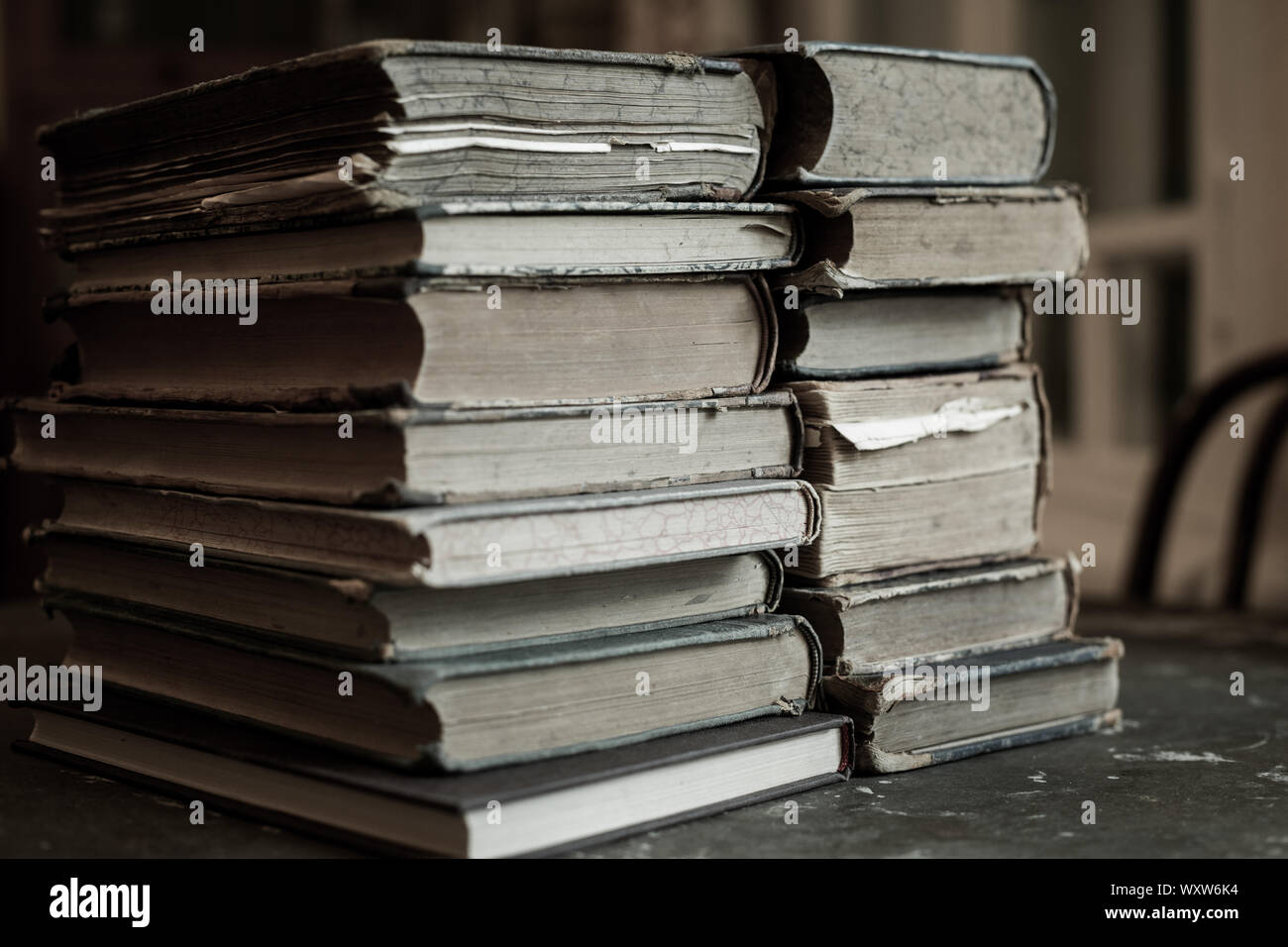 A stack of old tattered books Stock Photo - Alamy