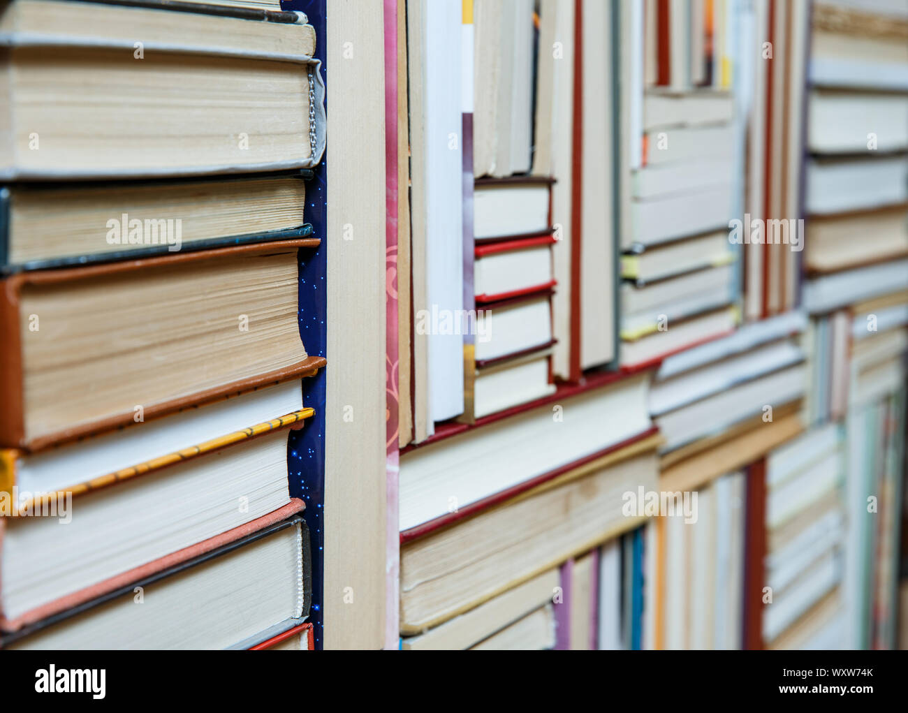 Books stack texture and background Stock Photo - Alamy