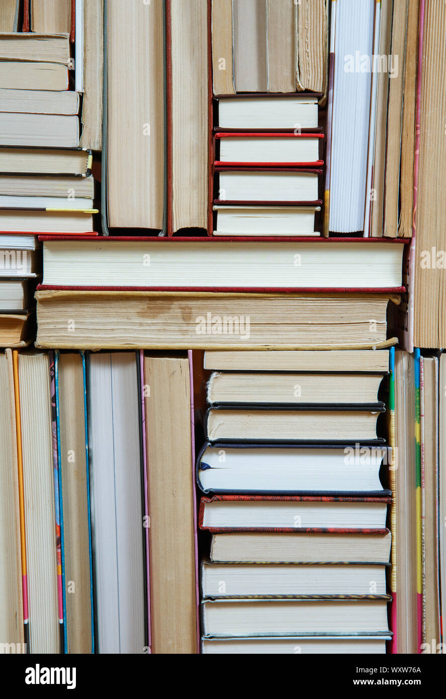 Books stack texture and background Stock Photo - Alamy