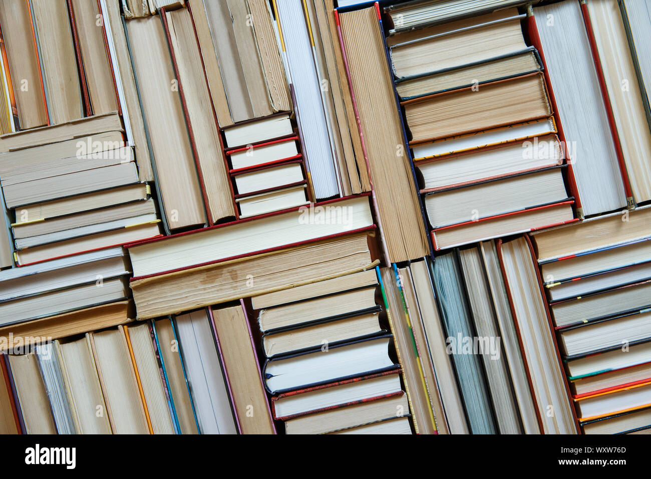 Books stack texture and background Stock Photo - Alamy
