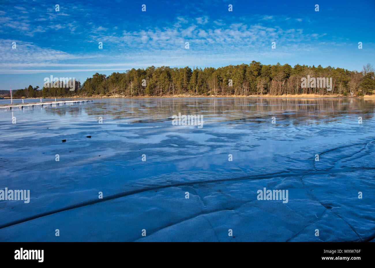 Frozen Baltic Sea coast in winter sun, Varmdo, Stockholm archipelago ...