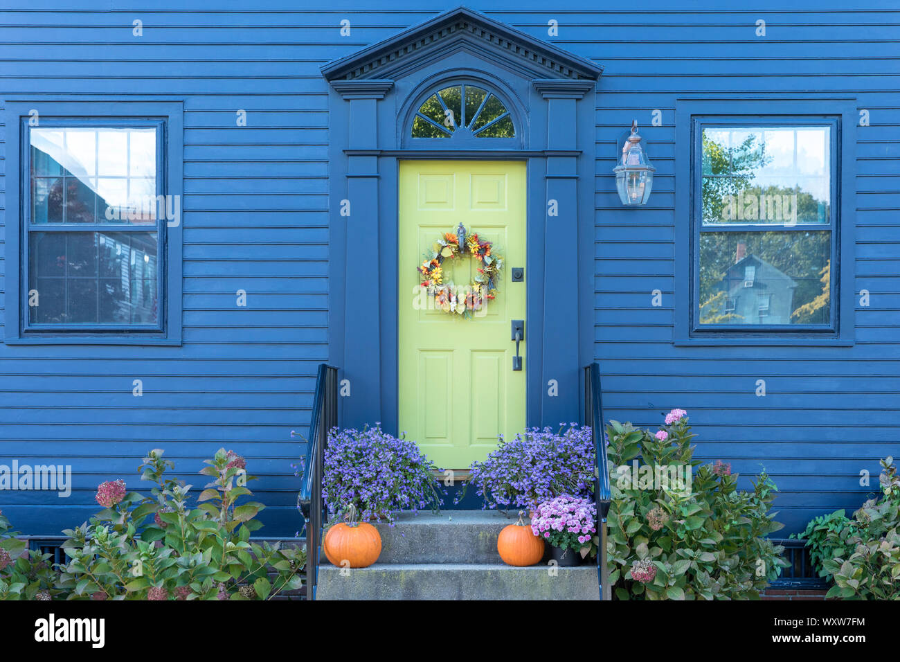 Typical traditional neat painted wooden clapboard house in Newport ...