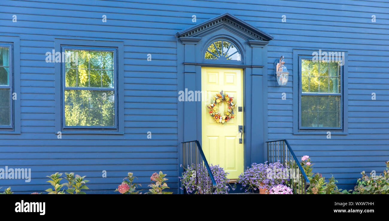 Typical traditional neat painted wooden clapboard house in Newport ...