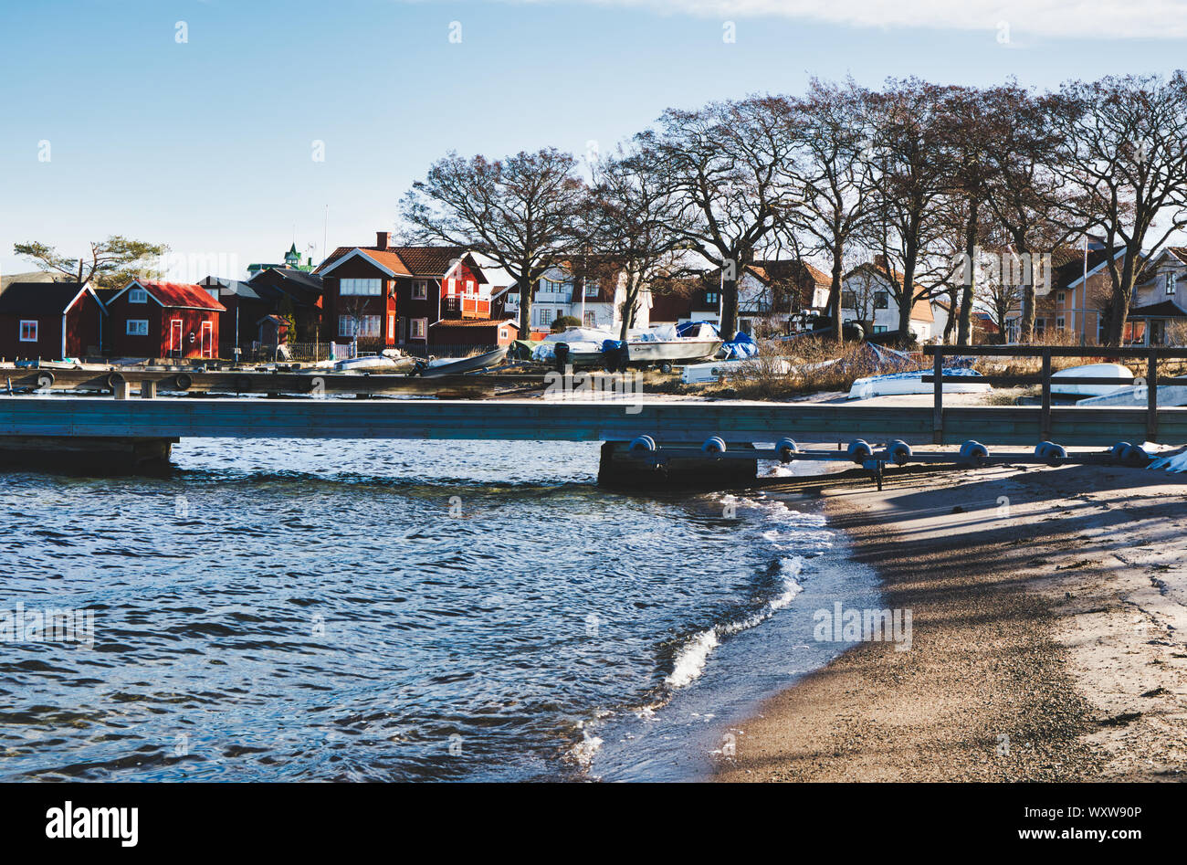 Beach with wooden jetty on the Stockholm archipelago island of Sandhamn ...