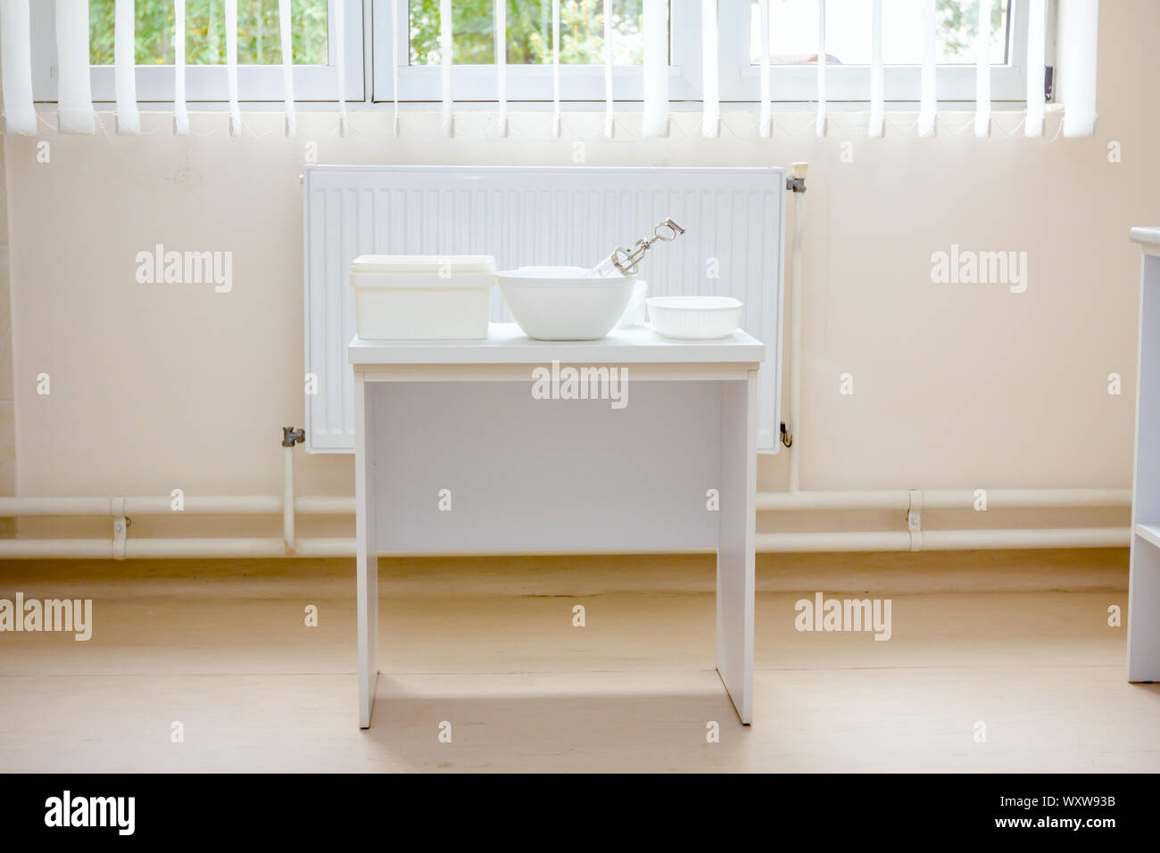 Doctor's table with medical equipment for ear irrigation placed in ...