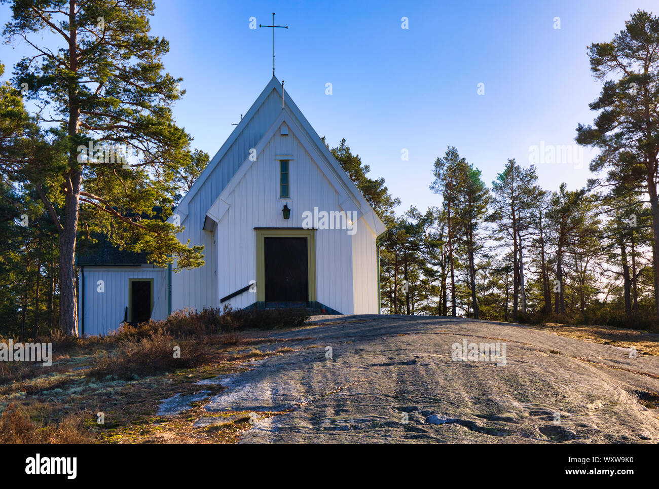 Wooden Sandhamn chapel and surrounding forest on the island of Sandhamn ...