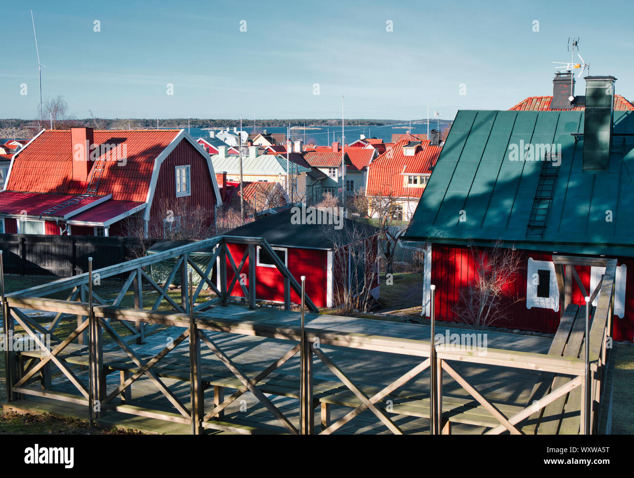 Wooden viewing terrace and colourful traditional homes on Sandhamn an ...