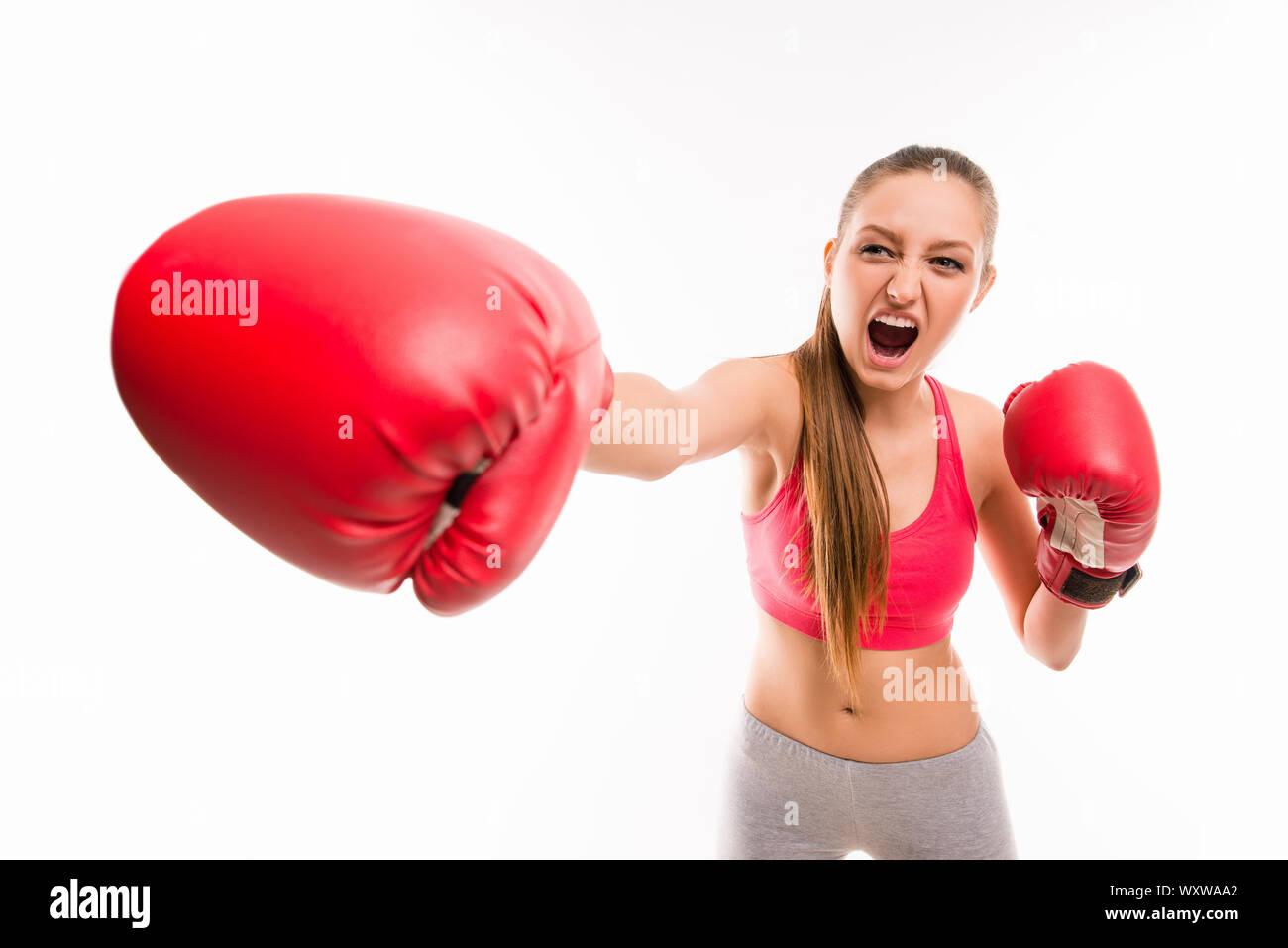 A portrait of angry girl in boxing gloves Stock Photo - Alamy