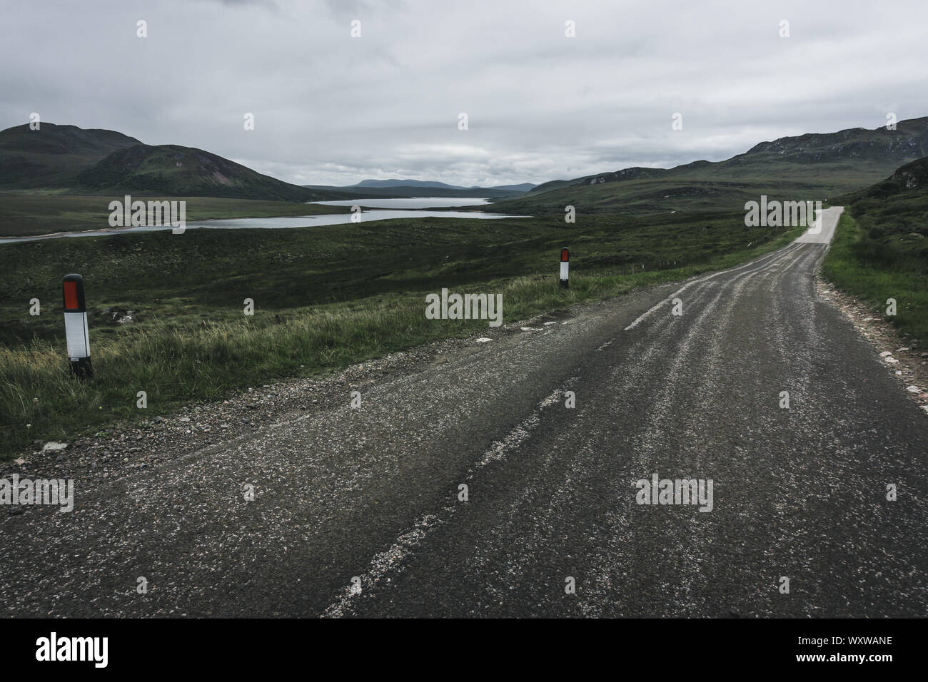 View of the A836 road in Caithness, Scotland as it passes Loch Loyal ...