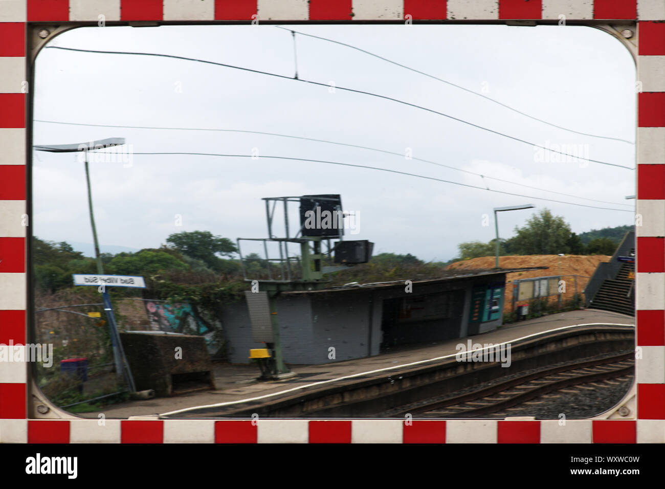 The reflections of a platform in a traffic mirror Stock Photo - Alamy