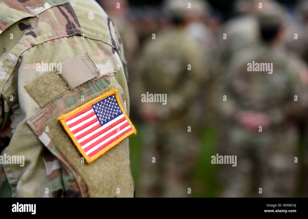 American Soldiers and Flag of USA on soldiers arm. US Army. Veteran Day ...