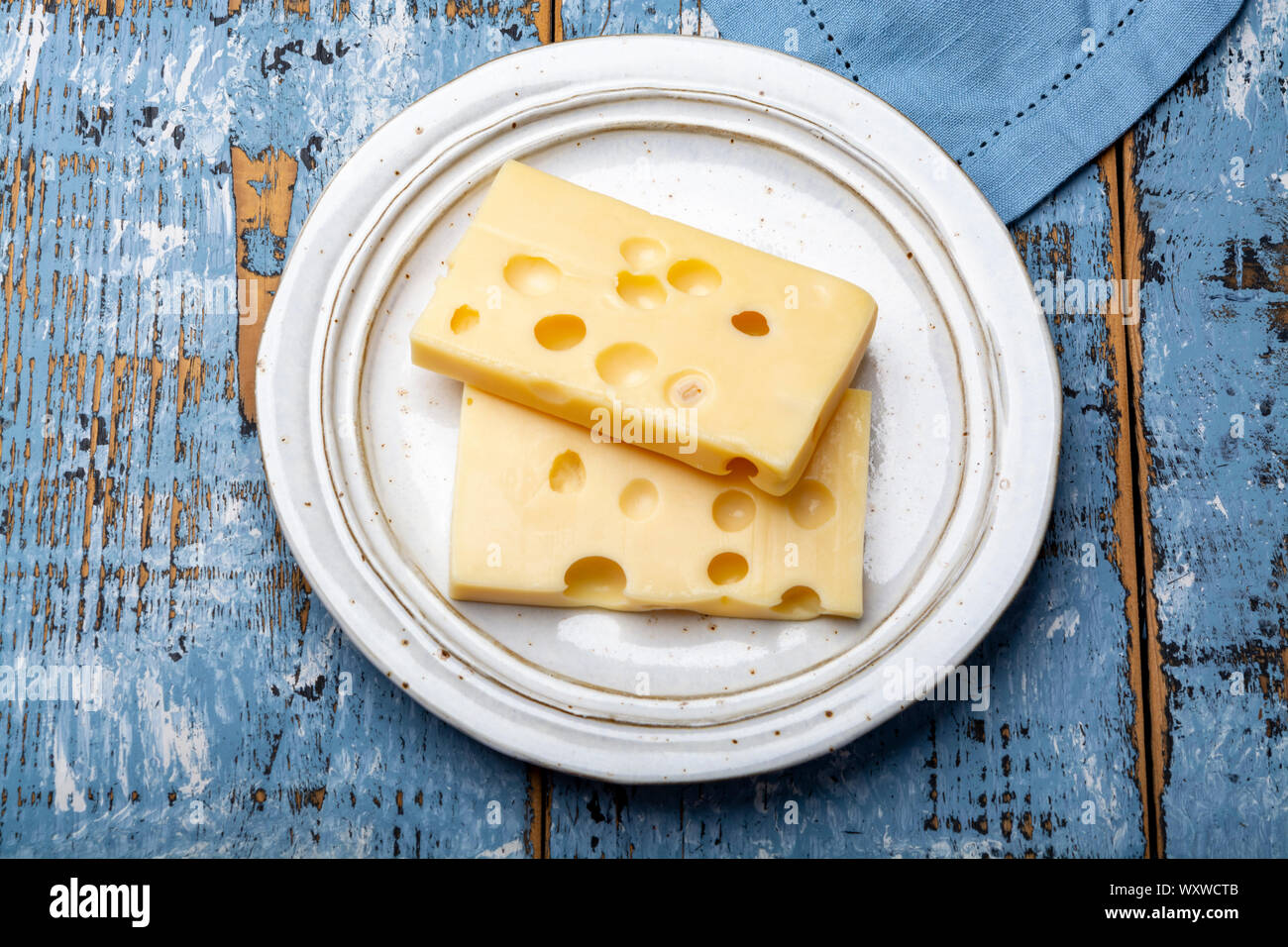 Two blocks of French emmental semi-hard cheese close up Stock Photo - Alamy