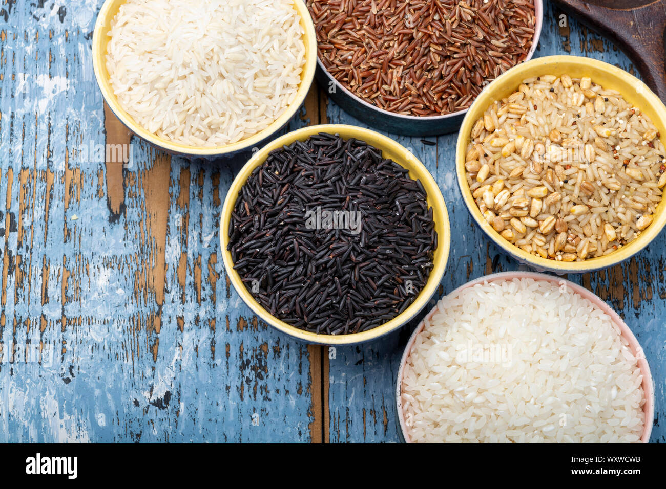 Different types of rice, white basmati, jasmine, arborio, brown and ...
