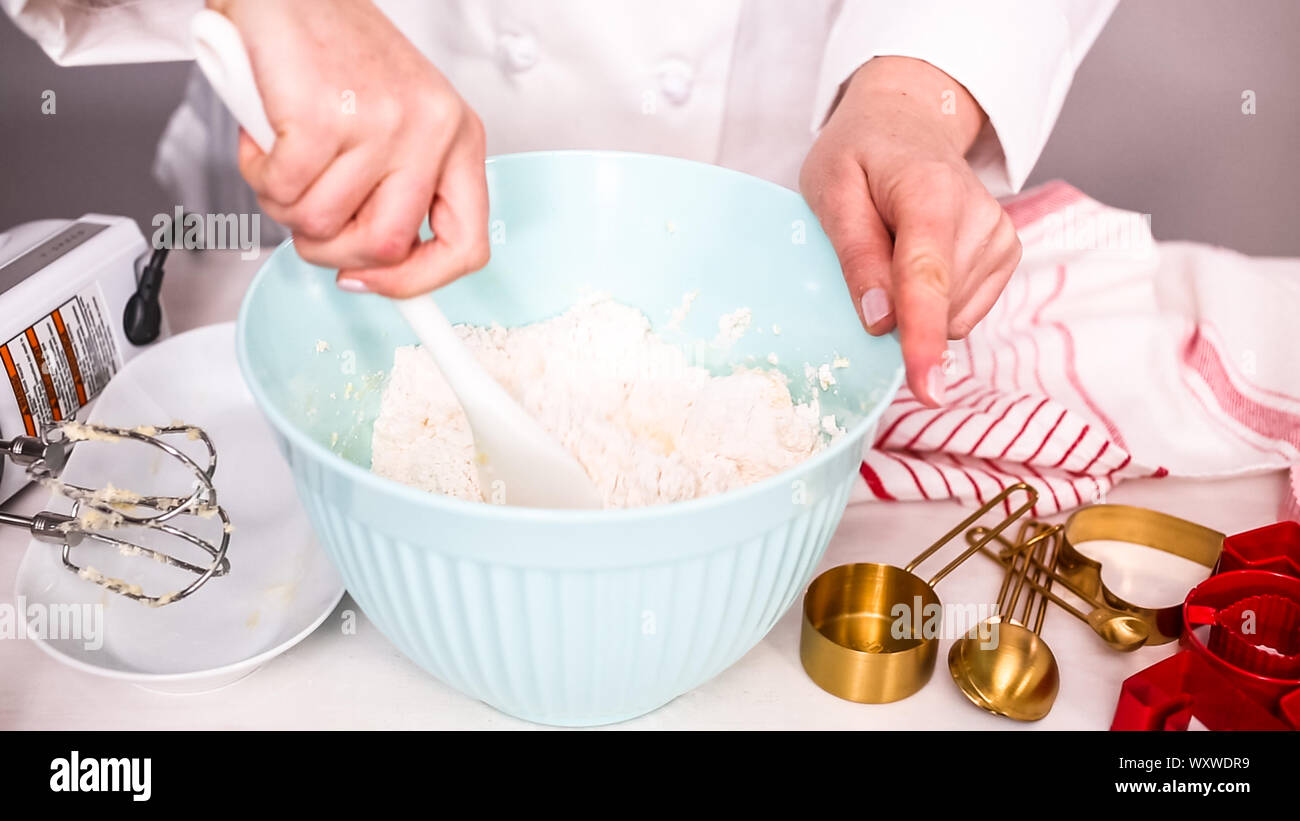 Step by step. Mixing sugar cookies dough in mixing bowl Stock Photo - Alamy