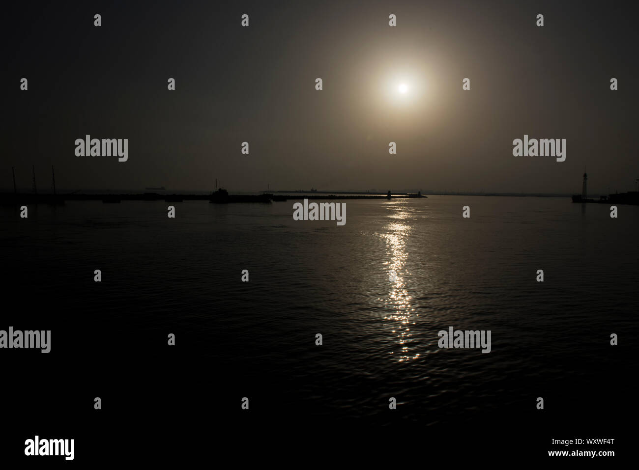 Sun reflection Over Water Stock Photo - Alamy