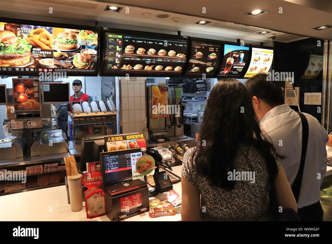 TAIPEI, TAIWAN - DECEMBER 3, 2018: Customers visit McDonald's ...