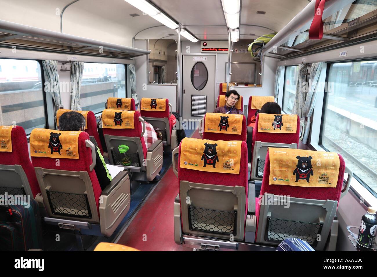 HUALIEN, TAIWAN - NOVEMBER 26, 2018: People ride a Taiwan Railways (TRA ...