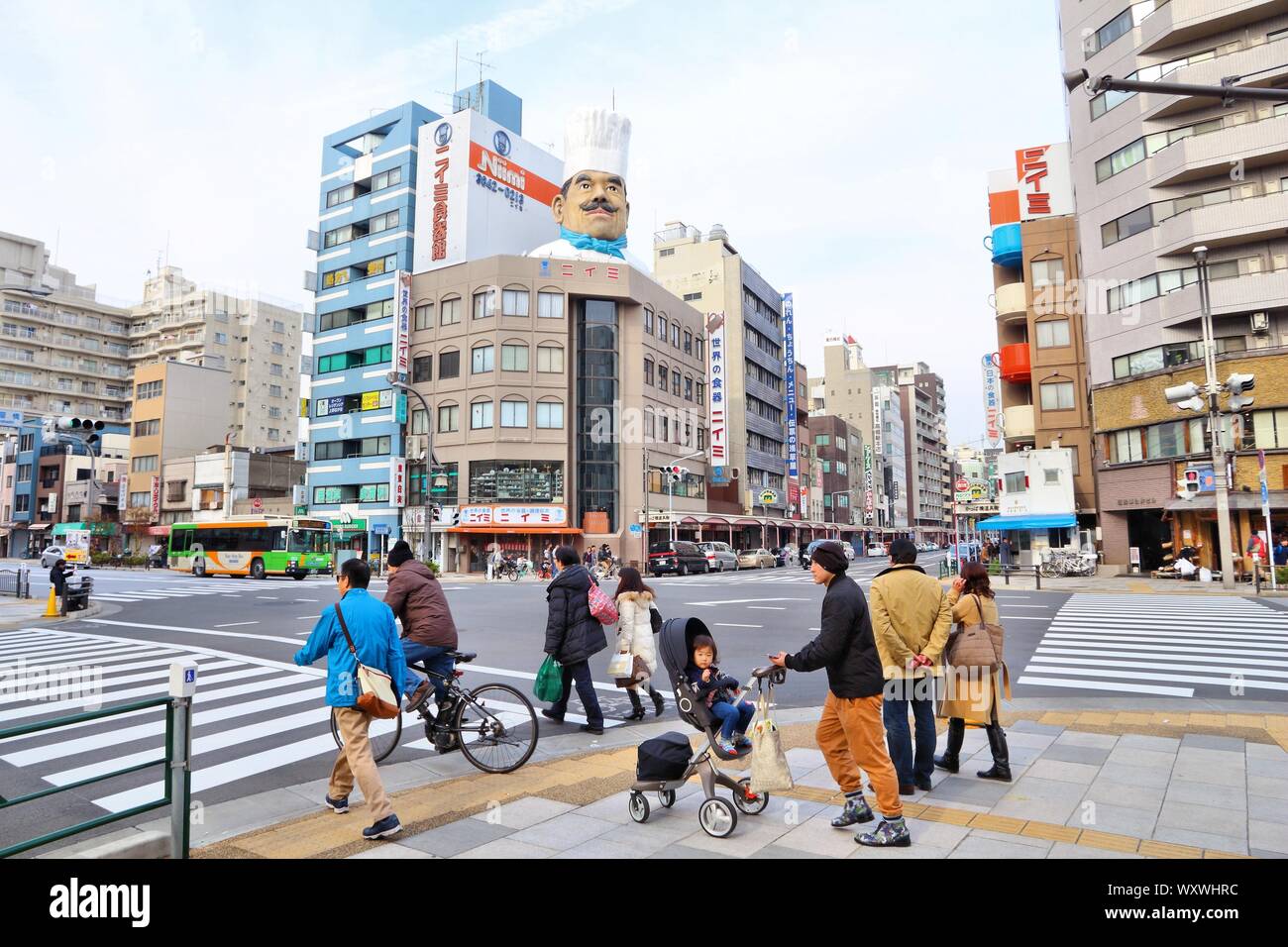 TOKYO, JAPAN - DECEMBER 4, 2016: People visit Kappabashi area of ...