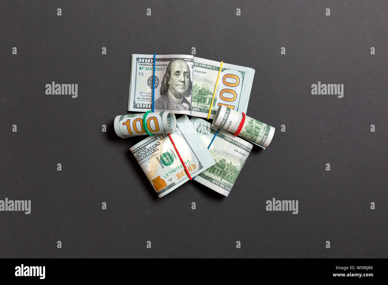 US Dollar bills bundles stack. one hundred dollar bills with stack of ...