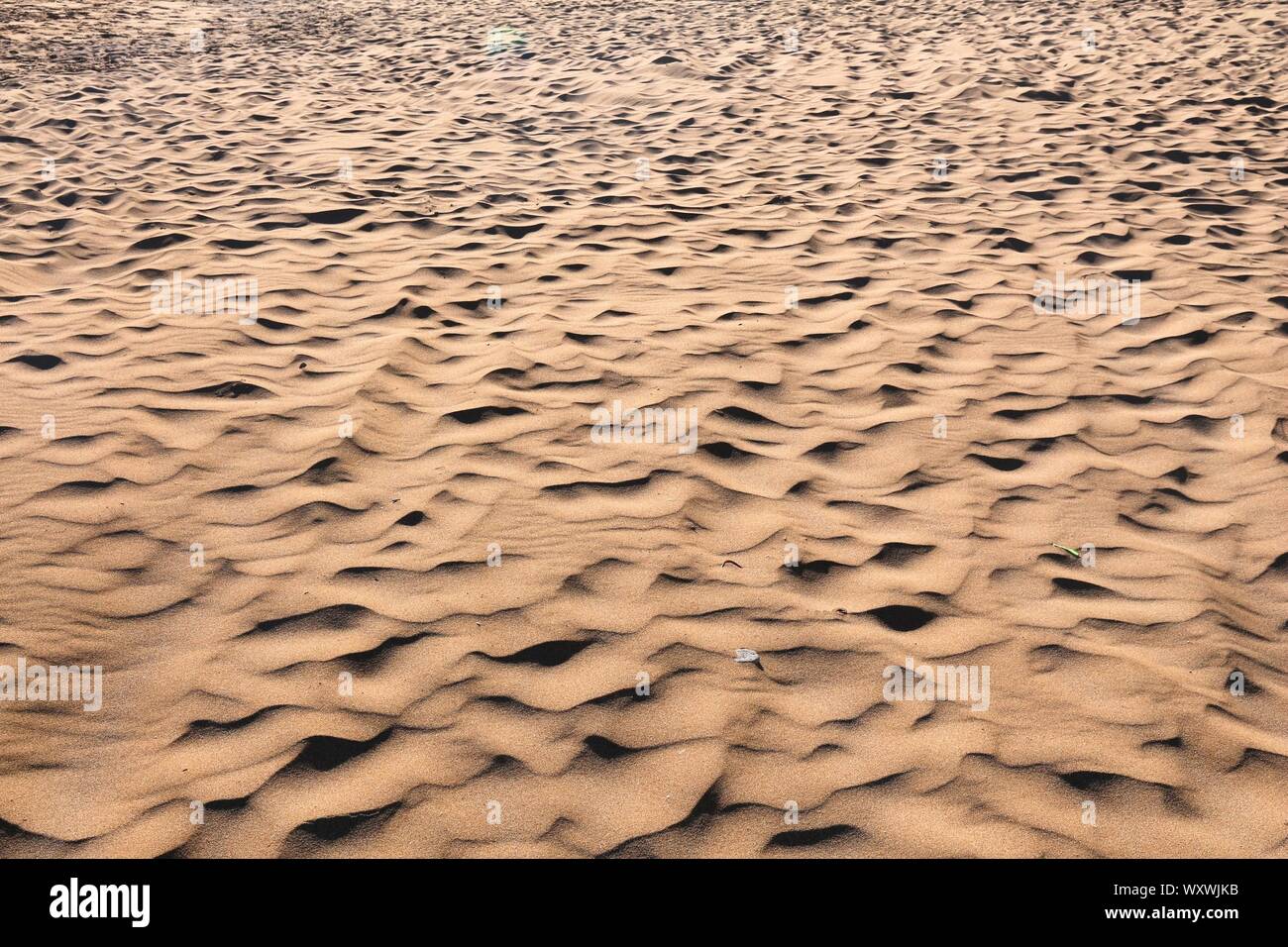 Mini sand dunes at a beach in Greece Stock Photo - Alamy