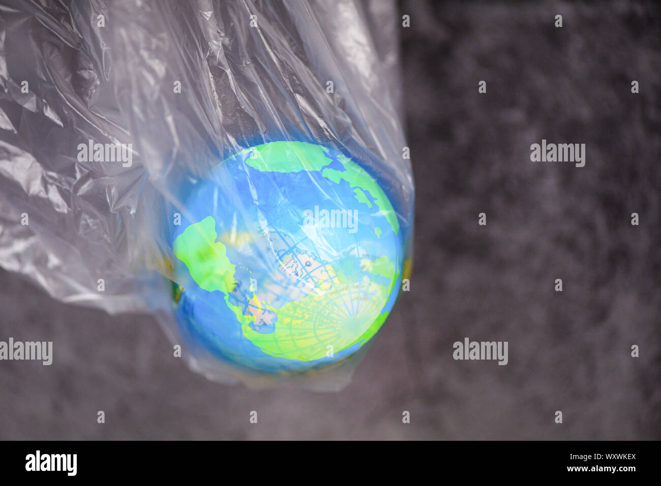 Plastic world or World Environment Day Concept / The planet earth in a ...