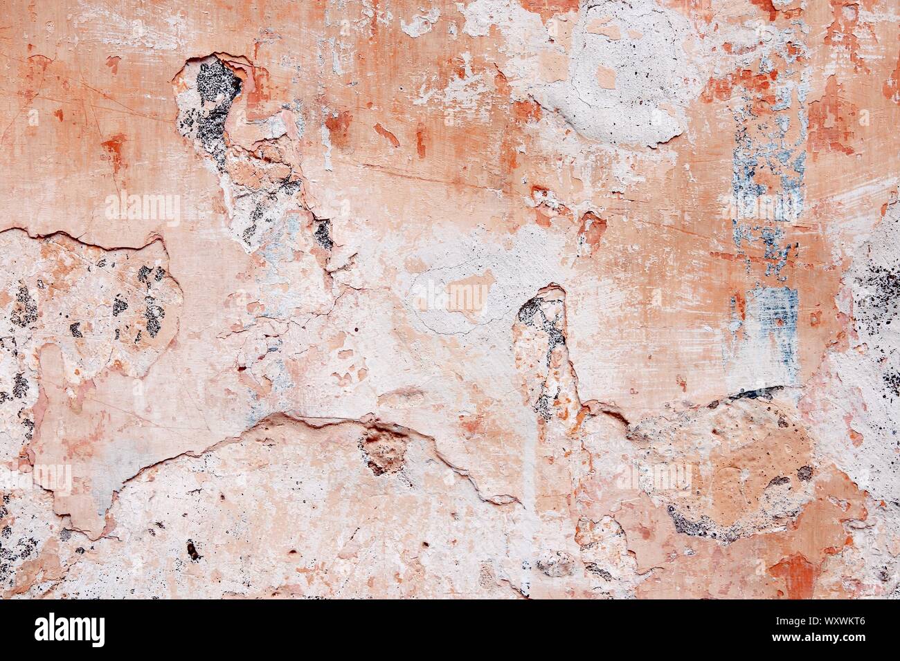 Texture of old red urban wall. City decay background Stock Photo - Alamy