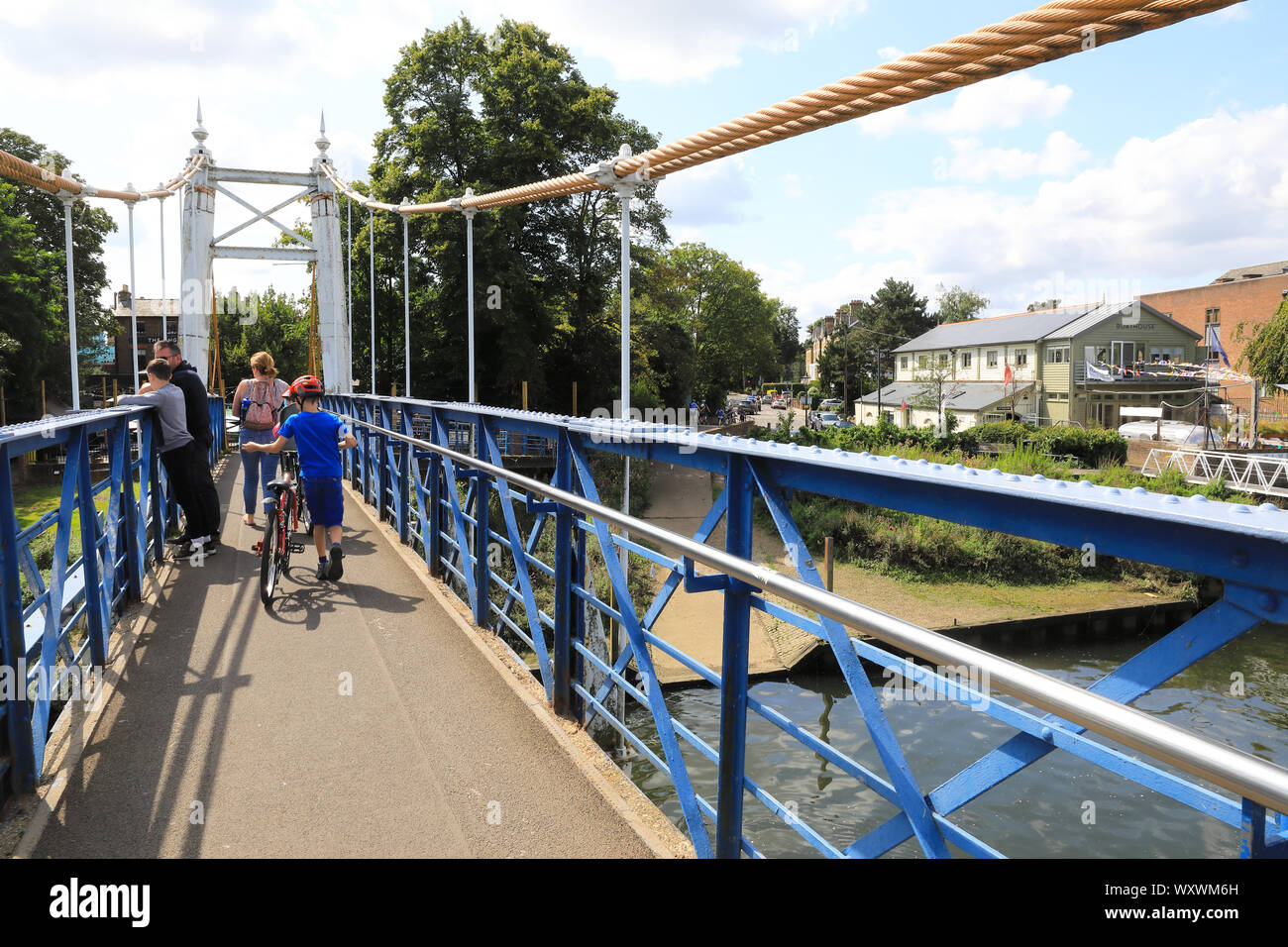 Footbridge over the River Thames at pretty Teddington Lock, in ...