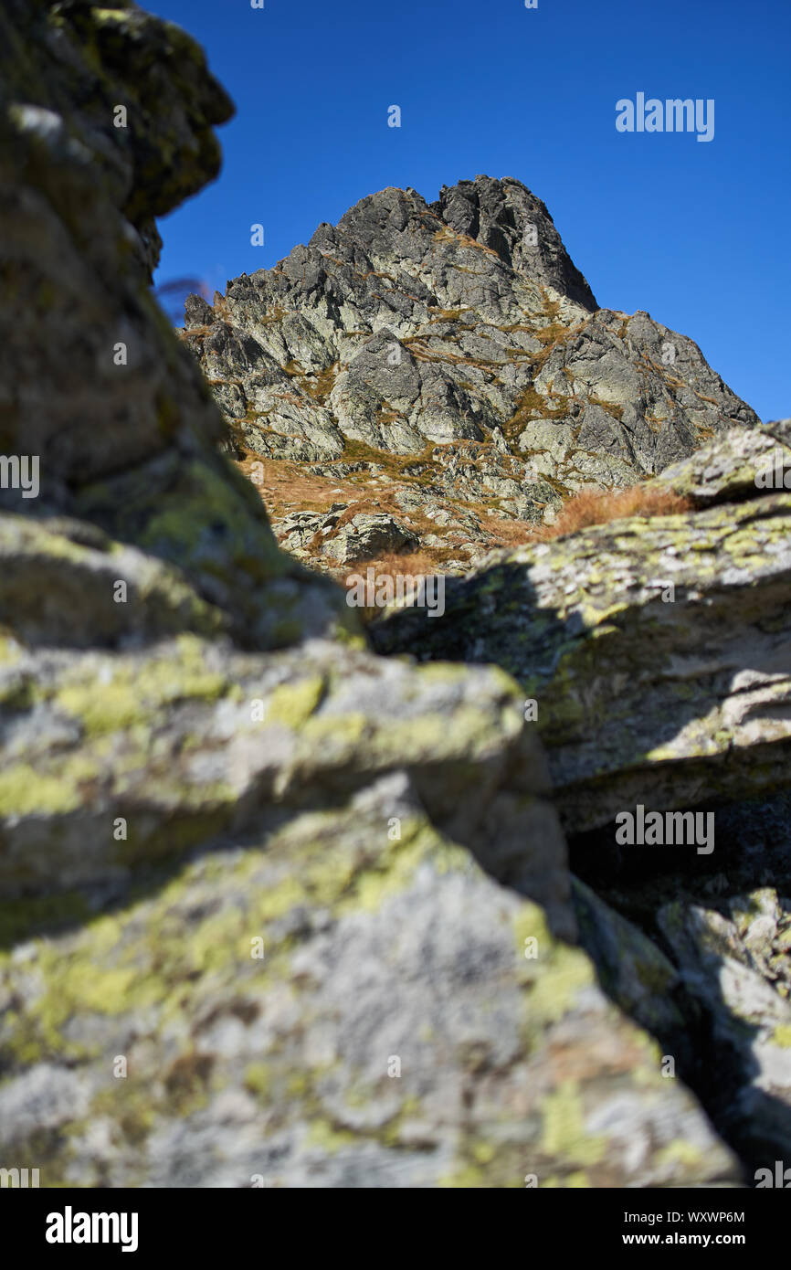Scene from high mountains with peaks and hiking trails Stock Photo - Alamy