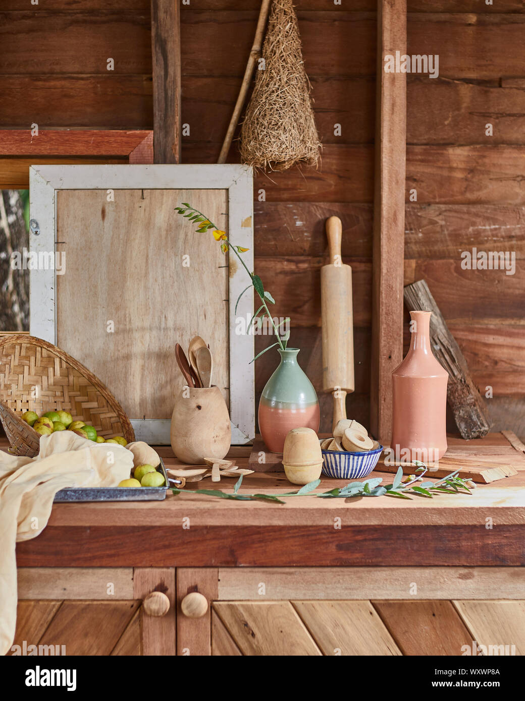 Kitchen utensils on a wood table Stock Photo - Alamy
