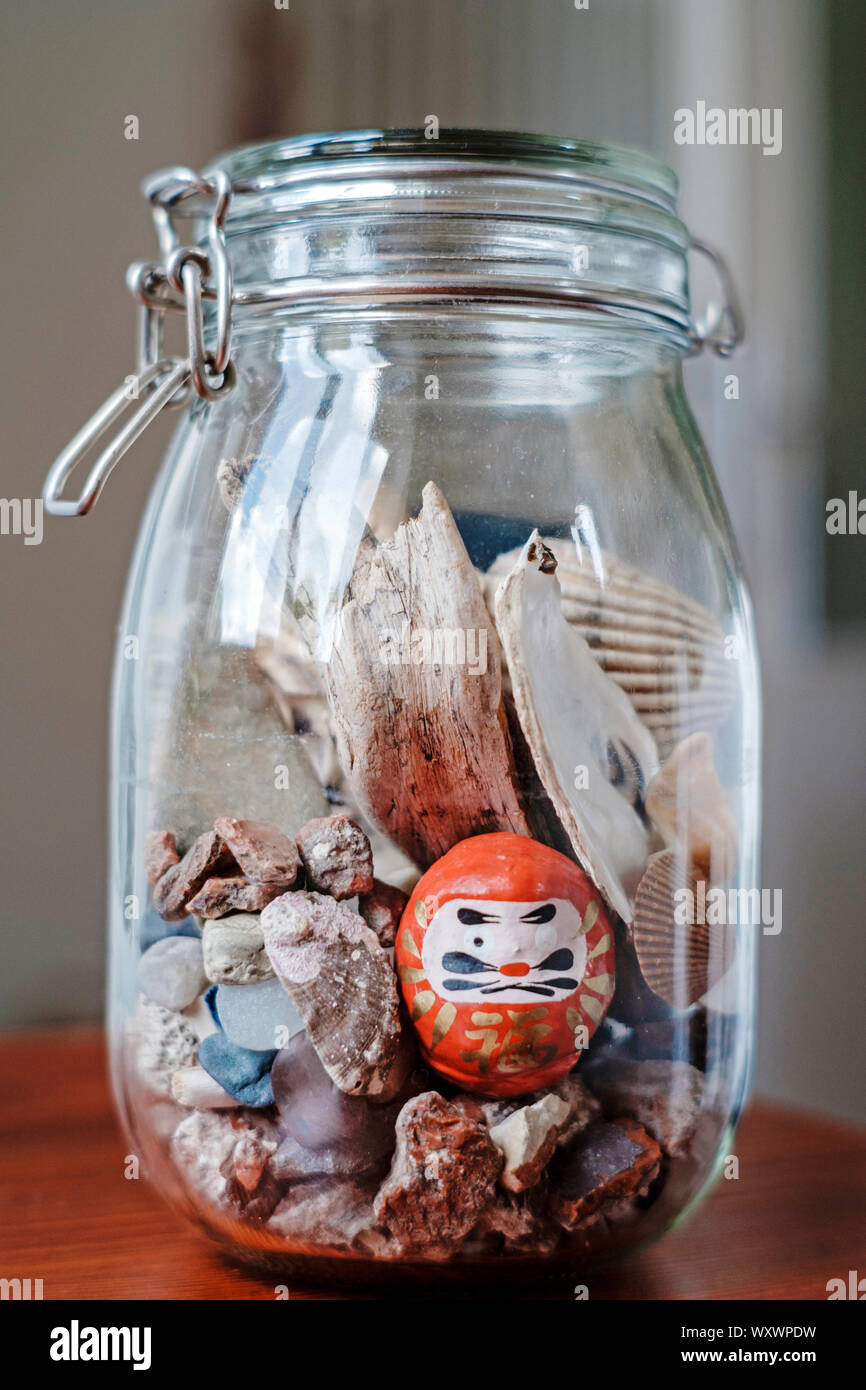 Home design: Ecosphere with stone garden and Japanese Daruma doll Stock ...