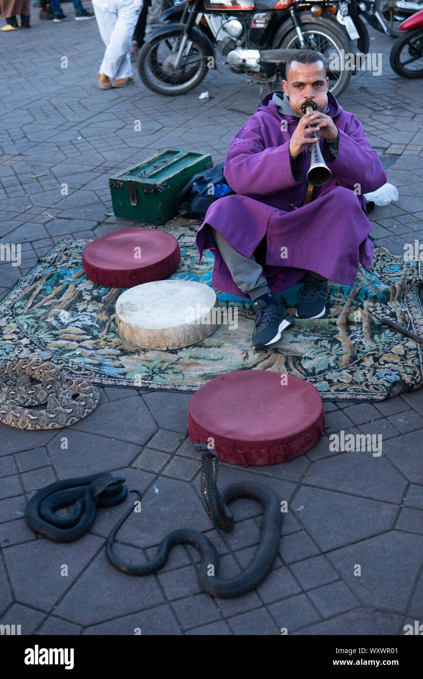 MARRAKESH, MOROCCO - 15 JAN 2019: Snake charmer at the Jemaa el-Fnaa ...