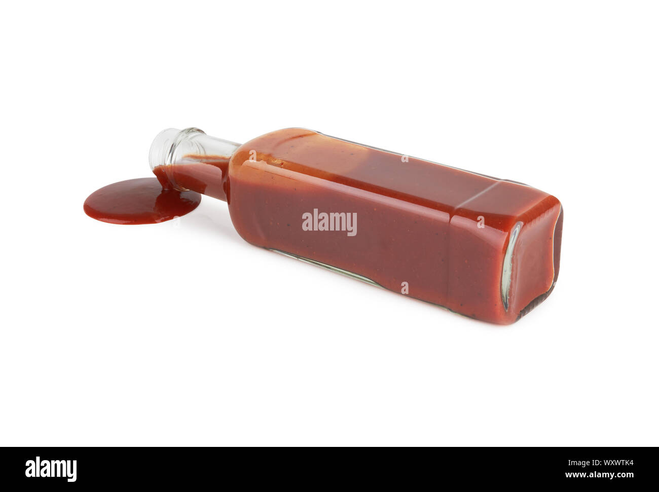 Bottle of red hot sauce isolated on white background Stock Photo - Alamy