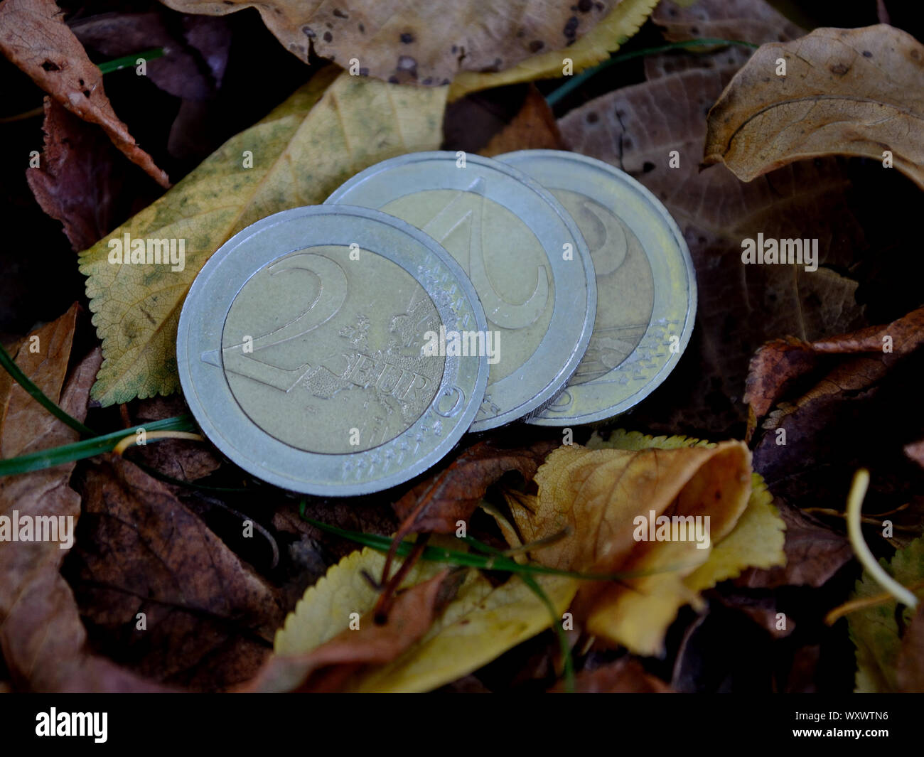 Ground coins hi-res stock photography and images - Alamy