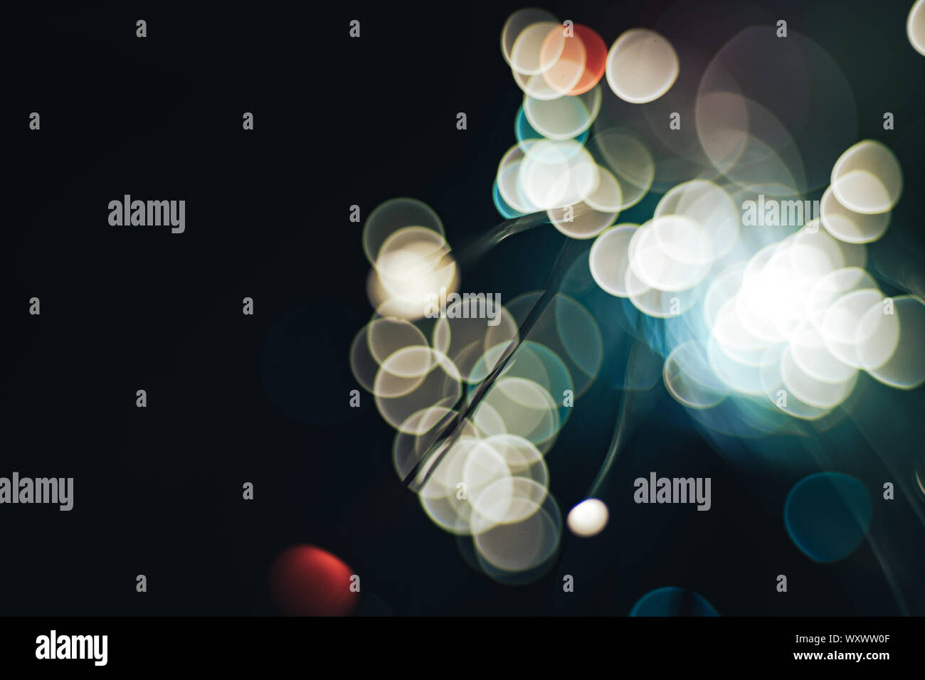 Beautiful optical fiber white light bokeh on a dark background Stock ...