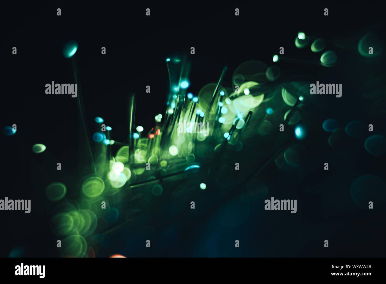 Beautiful green optical bokeh on a glow background Stock Photo - Alamy