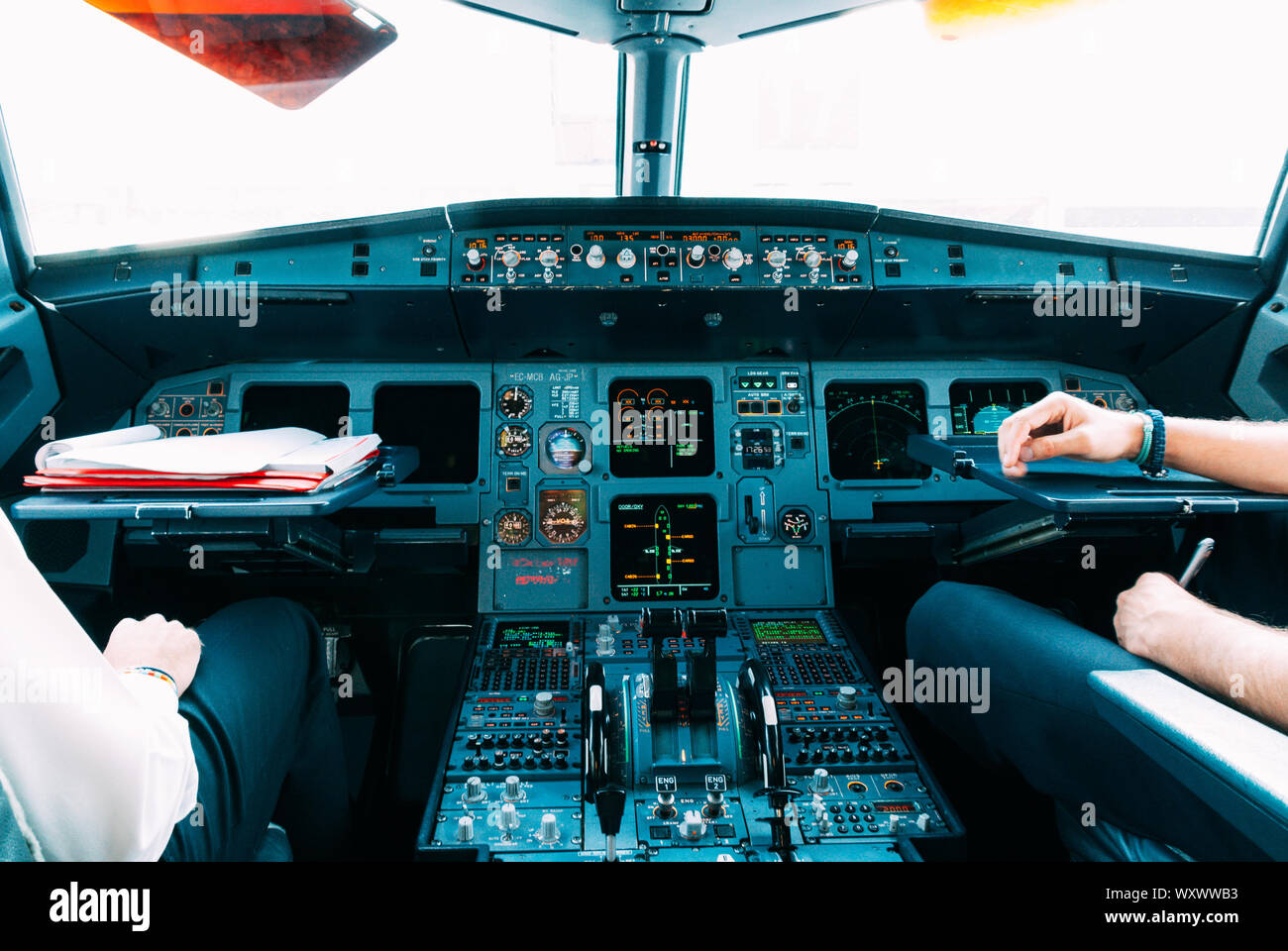 Pilots in the cockpit after a flight with commercial airplane Stock ...