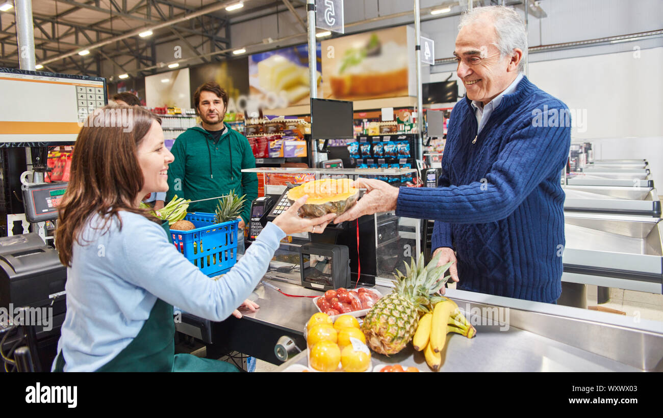 Staff checkout counter buy hi-res stock photography and images - Alamy