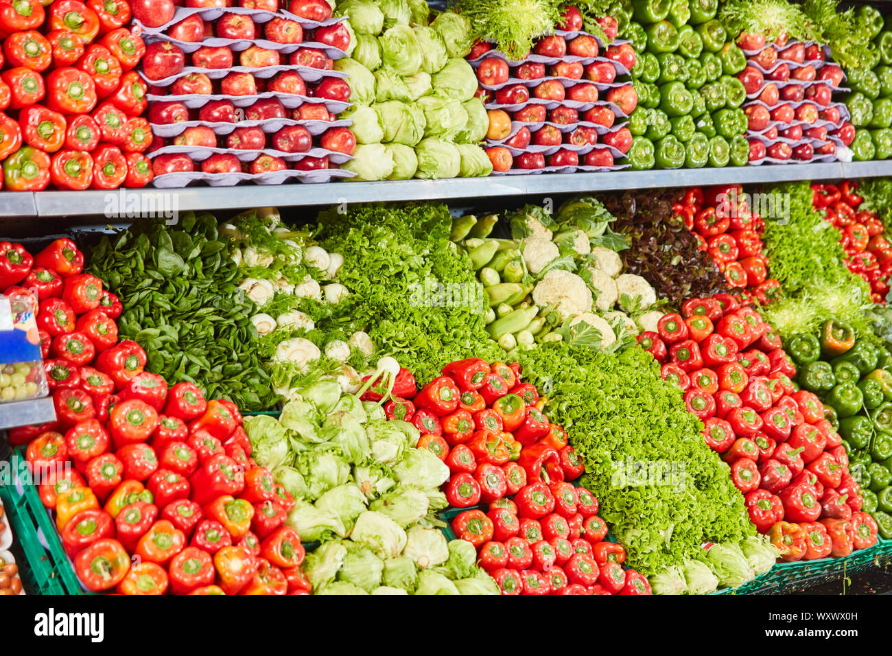 Large vegetables Assortment on the shelf in the vegetable department in ...