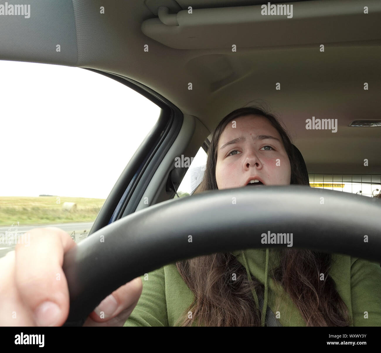 Girl steering wheel hi-res stock photography and images - Alamy