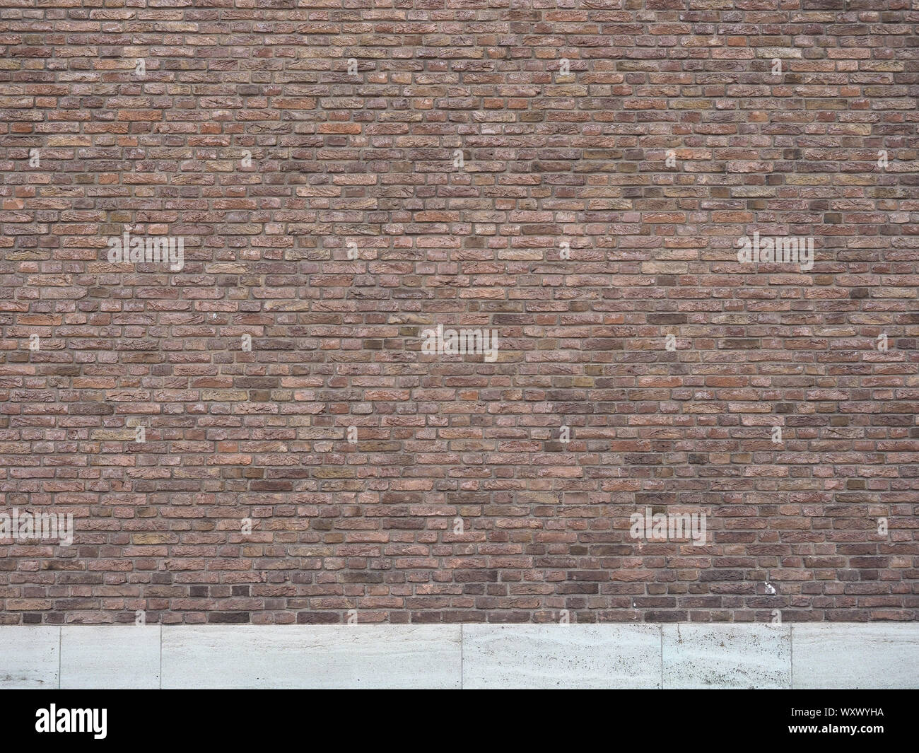 dark red brick wall useful as a background Stock Photo - Alamy