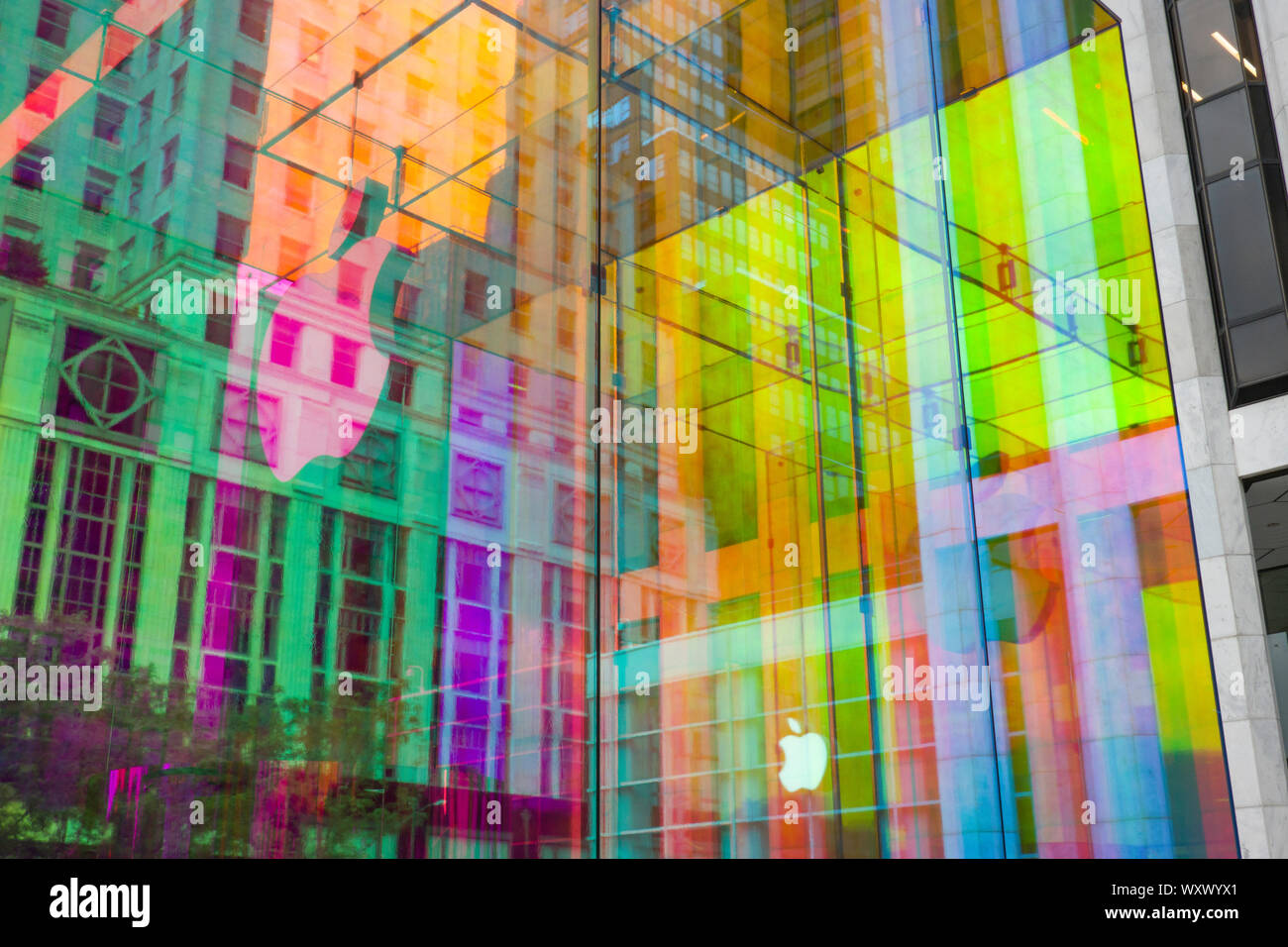 The iconic Apple store glass cube is in a temporary iridescent wrap ...
