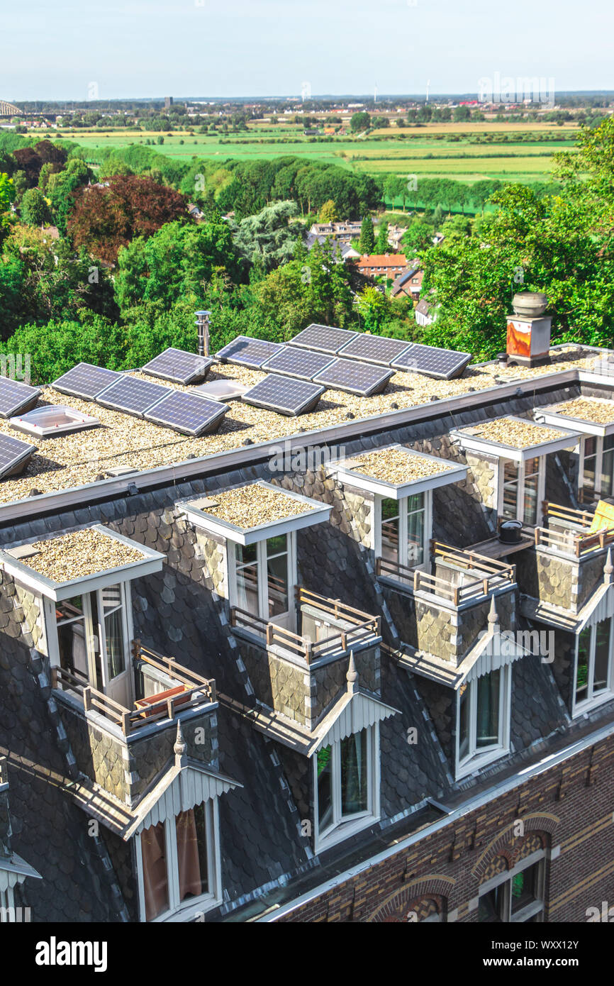 Roof of a Dutch church with solar panels Stock Photo - Alamy