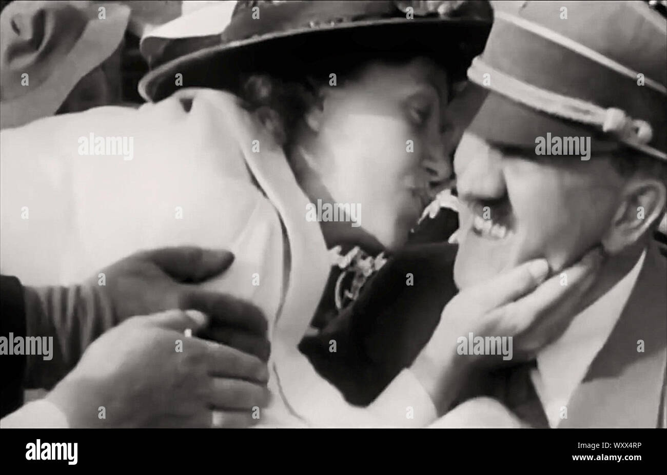 Adolf Hitler being kissed by a woman Stock Photo - Alamy