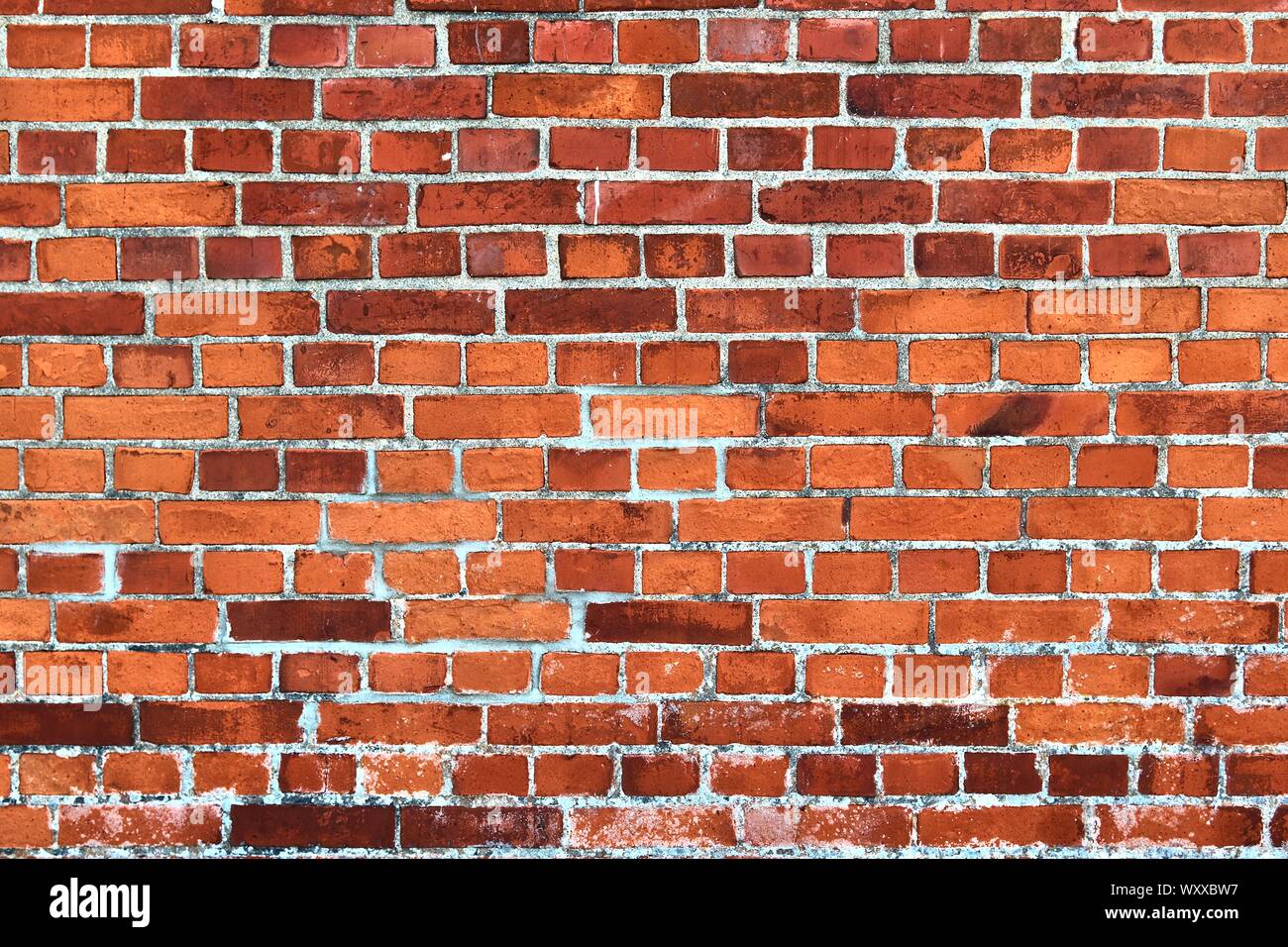 Detailed view on aged and weathered red brick walls at historical ...