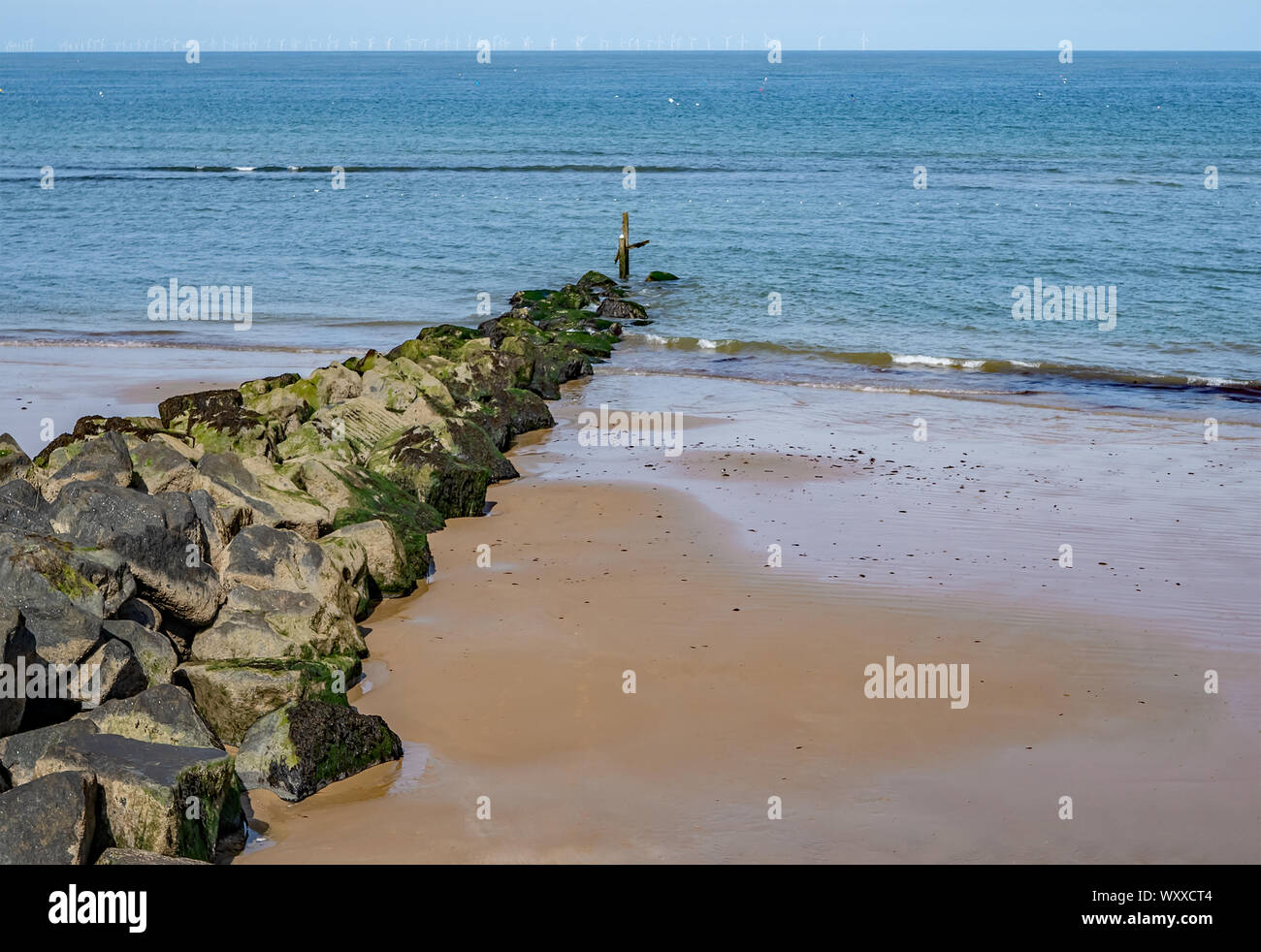 Rocky sea defences used to prevent erosion on Sheringham beach Stock ...