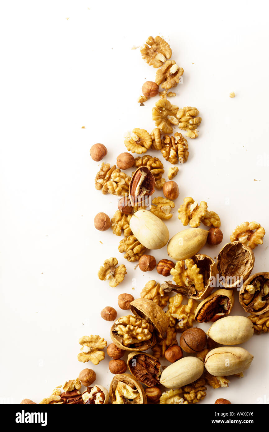 Overhead image of a group of various nuts with nutshells isolated on ...